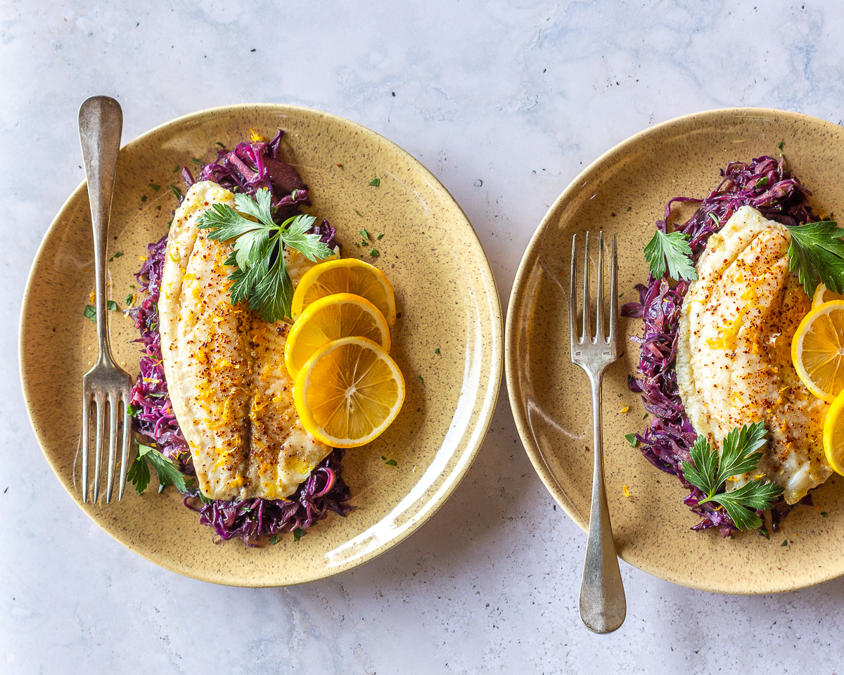 Lemon and Garlic Fish Over Sautéed Cabbage – Primal Wellness