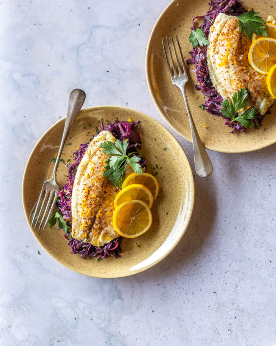Lemon and Garlic Fish Over Sautéed Cabbage – Primal Wellness
